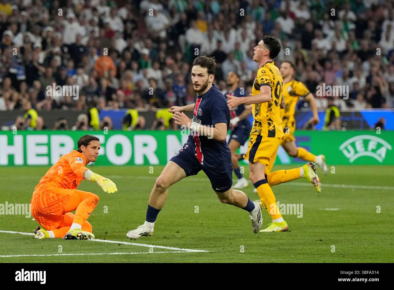 PSG's Khvicha Kvaratskhelia celebrates after scoring his side's fourth ...