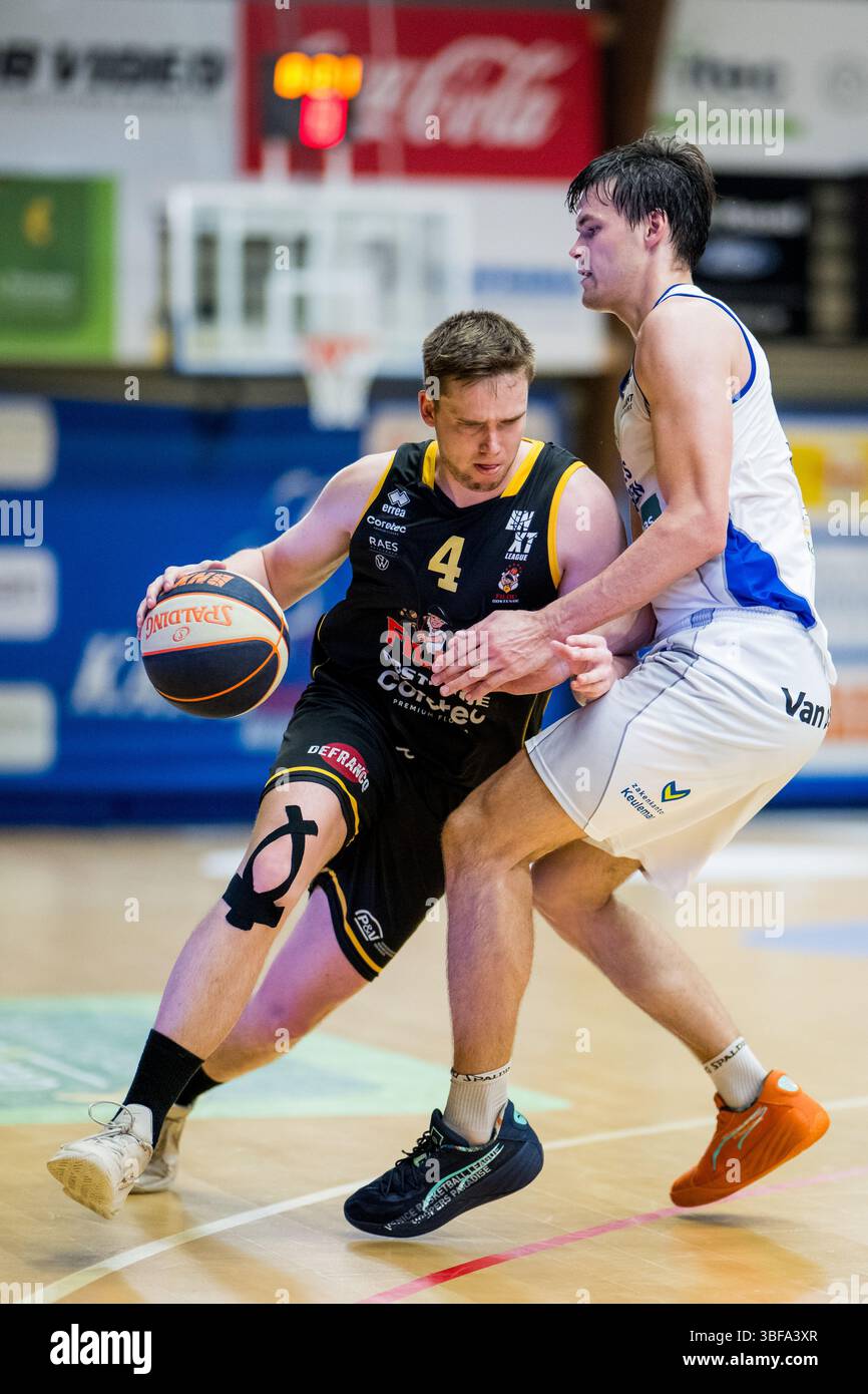 Mechelen, Belgium. 31st May, 2025. Oostende's Simon Buysse and Mechelen's Seppe Willems fight ...