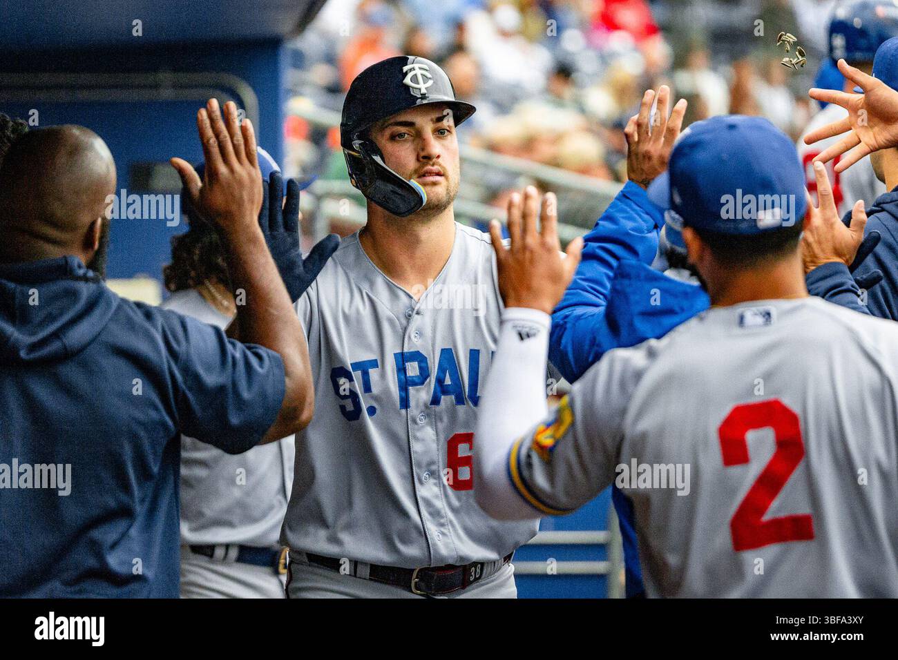 Omaha, NE U.S. 27th May, 2025. St. Paul Saints Matt Wallner (60) (MLB Rehab) gets high fives in ...