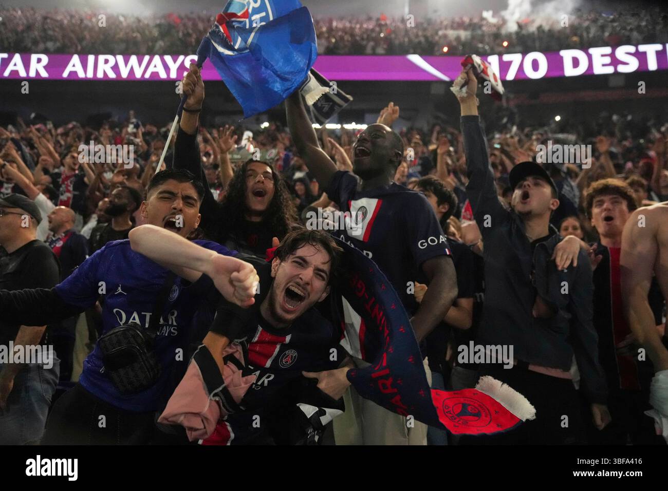 PSG supporters celebrate during the Champions League final soccer match ...