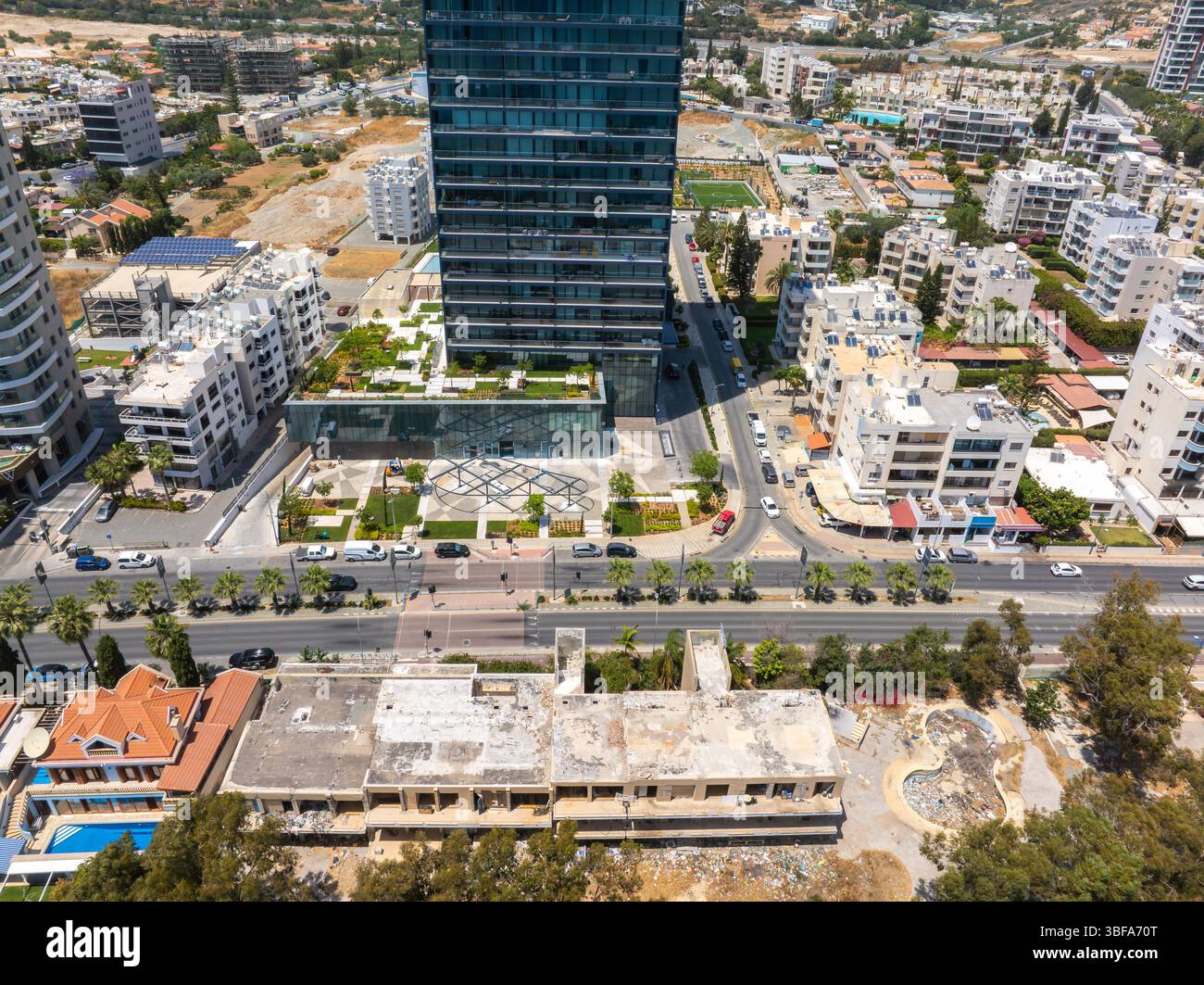 Aerial view of Limassol, Cyprus, featuring a glass skyscraper ...