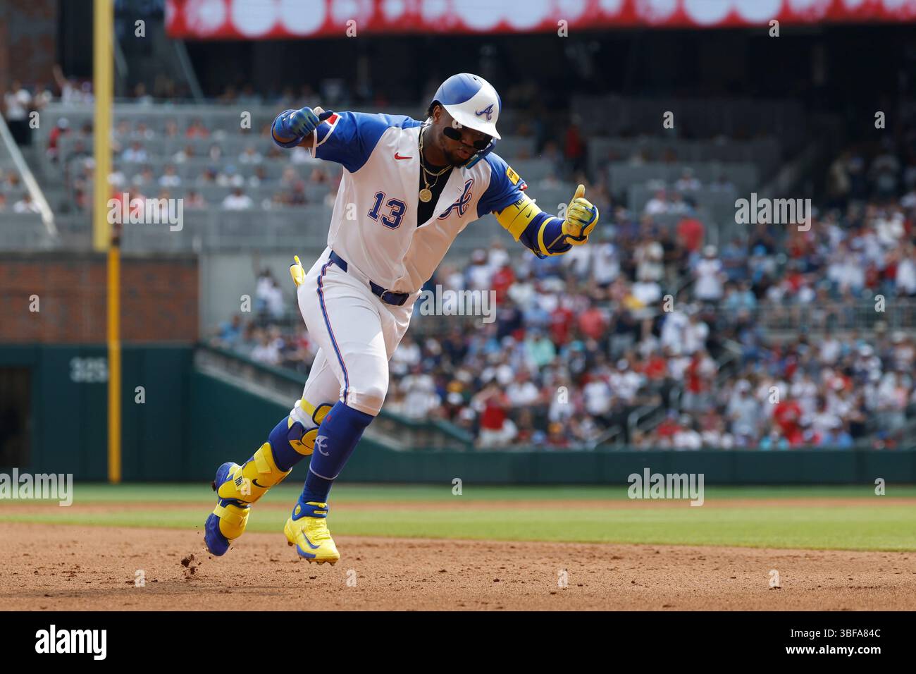 Atlanta Braves' Ronald Acuña Jr. celebrates as he rounds the bases ...
