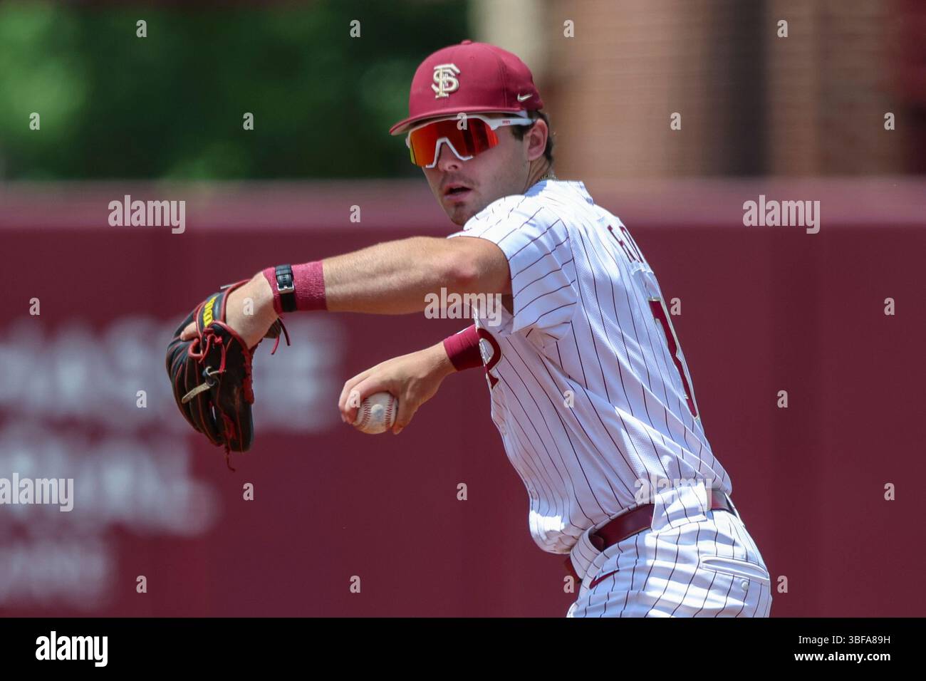 Florida State infielder Drew Faurot (3) warms up before an NCAA ...