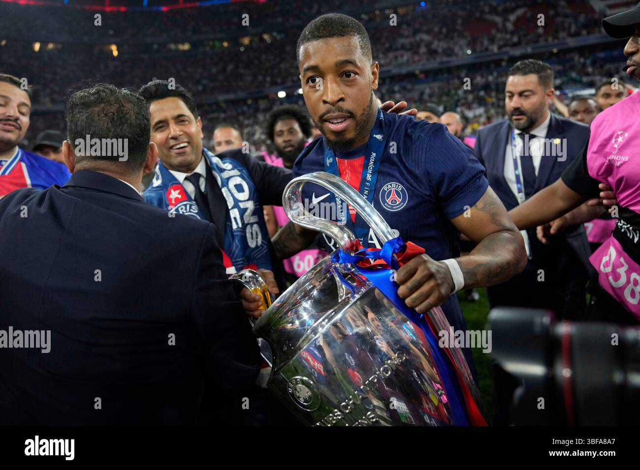 PSG owner Nasser bin Ghanim Al-Khelaifi kisses the trophy after the ...