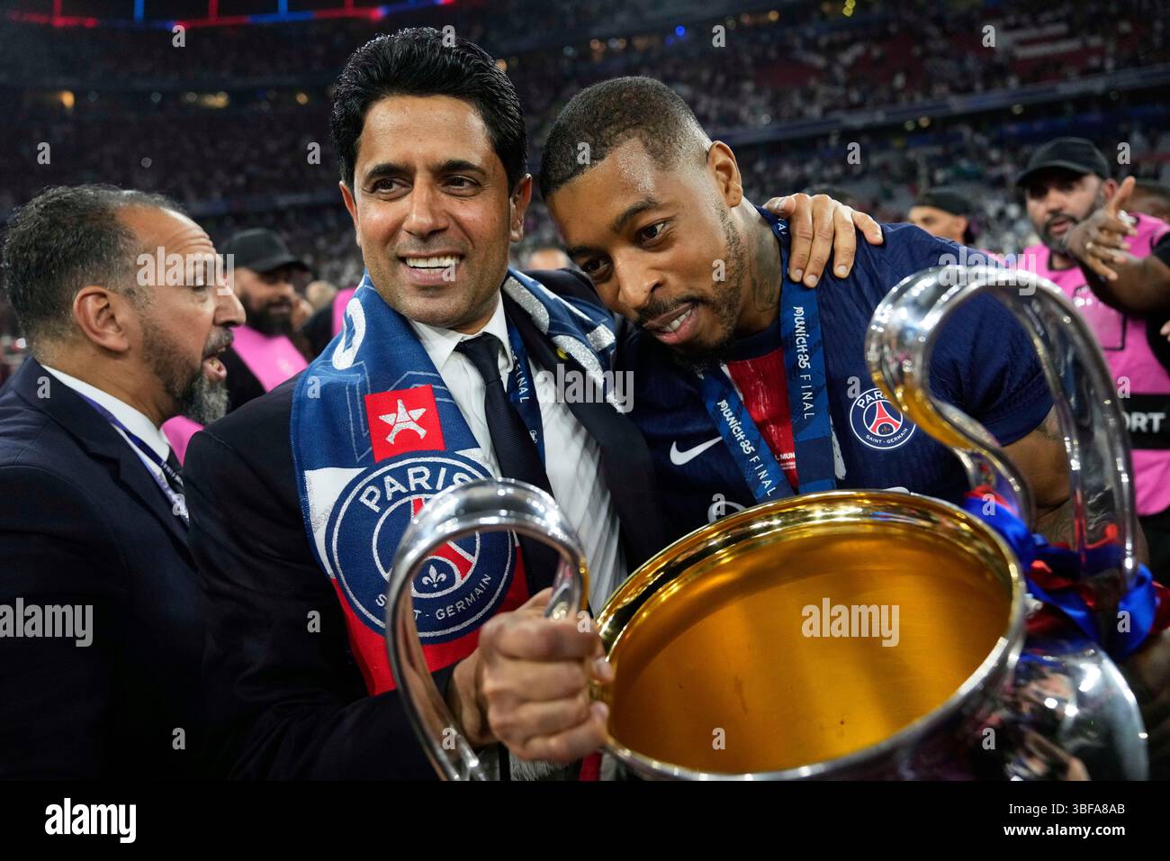PSG owner Nasser bin Ghanim Al-Khelaifi kisses the trophy after the ...