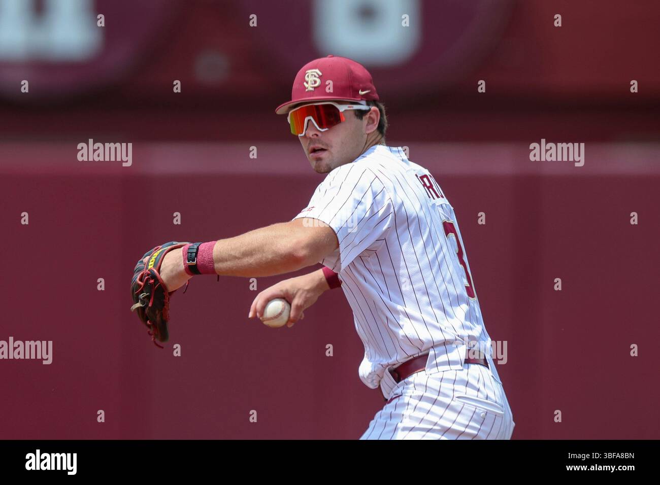 Florida State infielder Drew Faurot (3) warms up before an NCAA ...