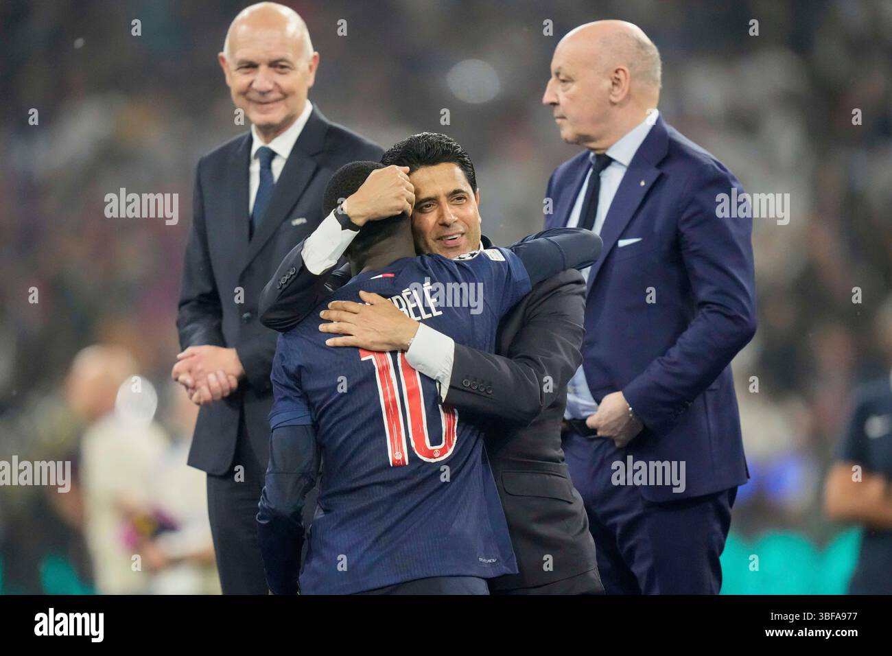 PSG owner Nasser bin Ghanim Al-Khelaifi hugs PSG's Ousmane Dembele ...
