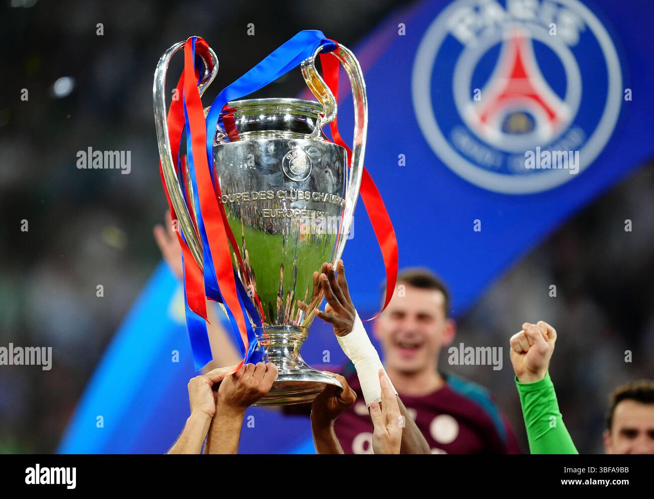 Paris Saint-Germain lift the trophy after winning the UEFA Champions ...