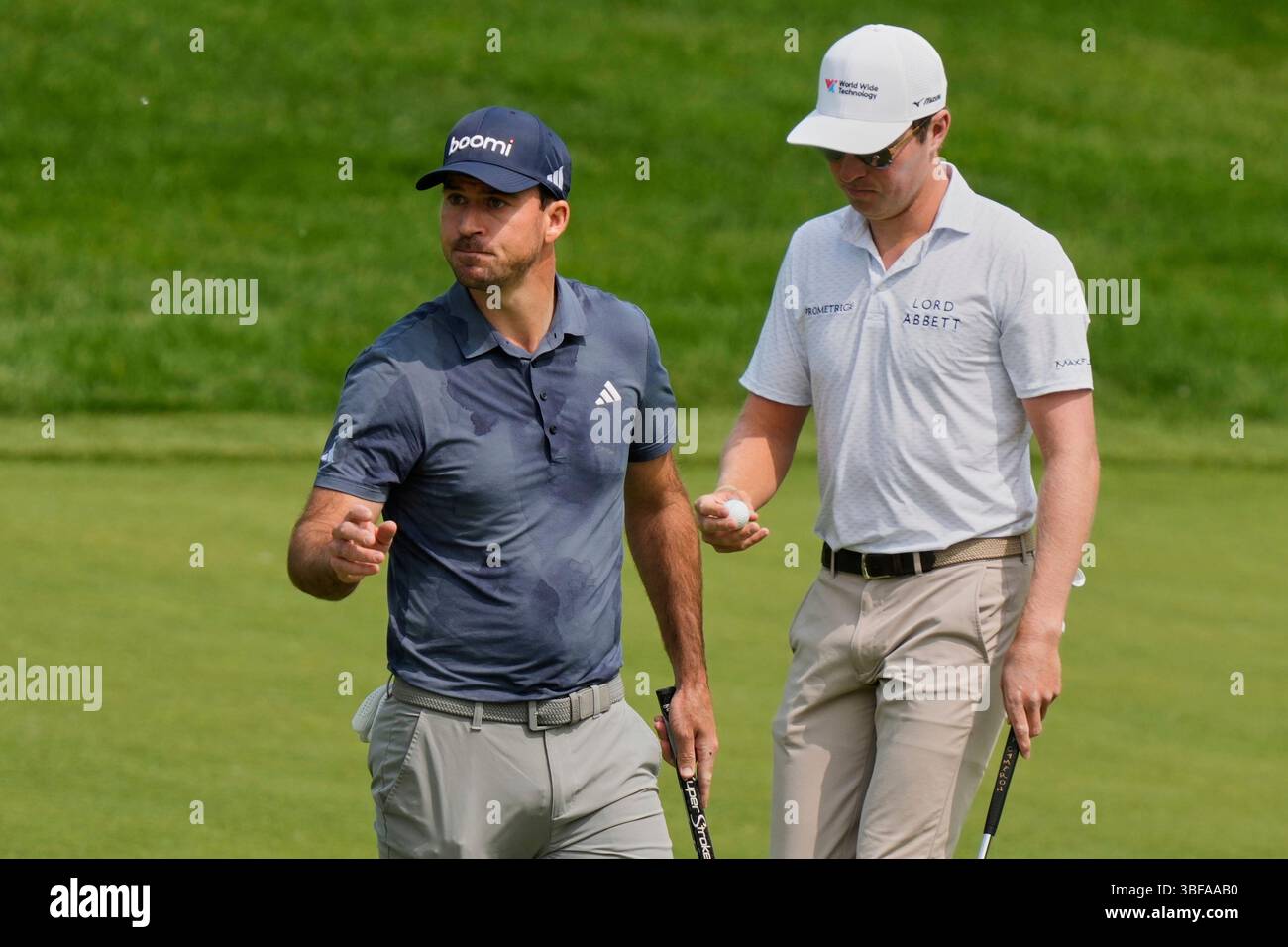 Nick Taylor gestures after his putt on the fourth green during the ...