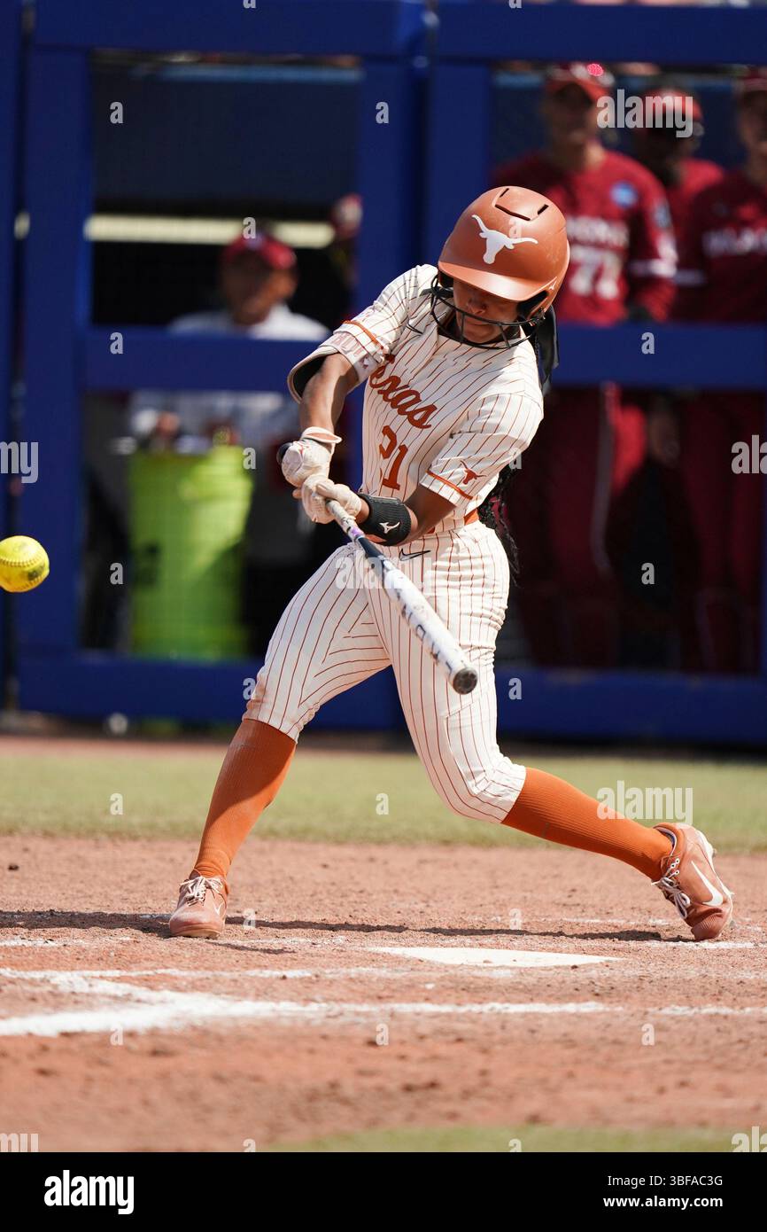 Texas outfielder Kayden Henry (21) hits a homer during an NCAA softball ...