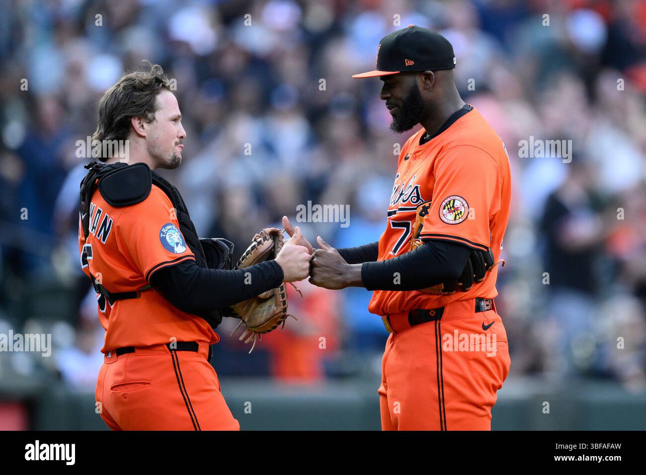 Baltimore Orioles catcher Adley Rutschman, left, and relief pitcher ...