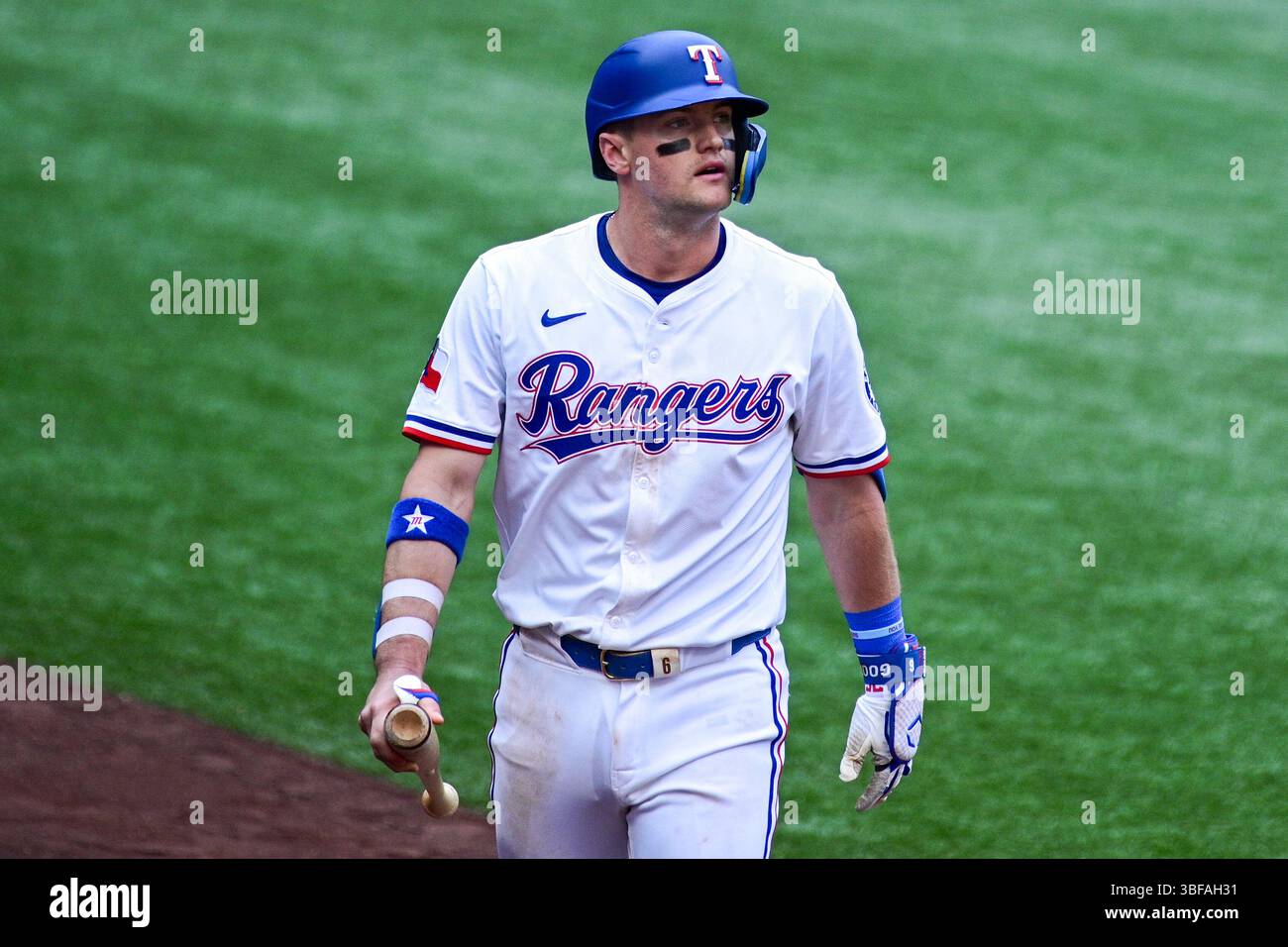 Texas Rangers' Josh Jung looks up at a video display as making his way ...