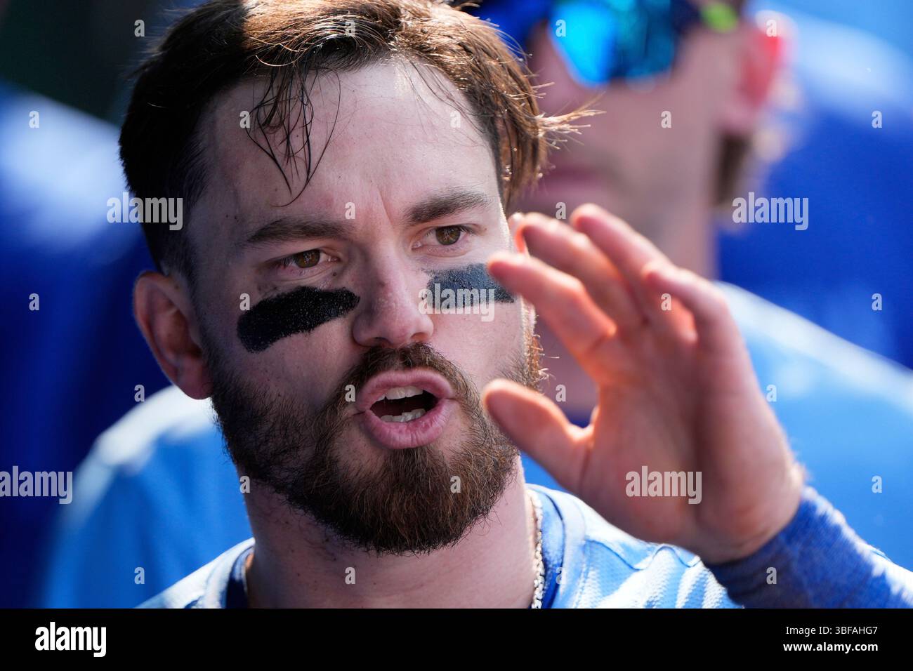 Kansas City Royals' Nick Loftin celebrates in the dugout after scoring ...