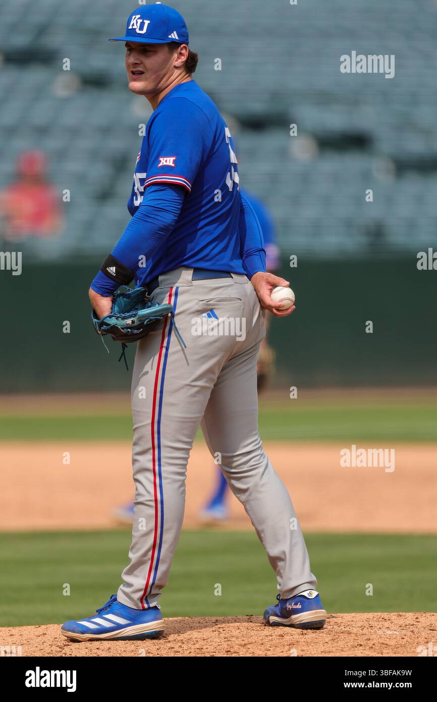 May 31, 2025: Kansas pitcher Alex Breckheimer (35) glances over his ...