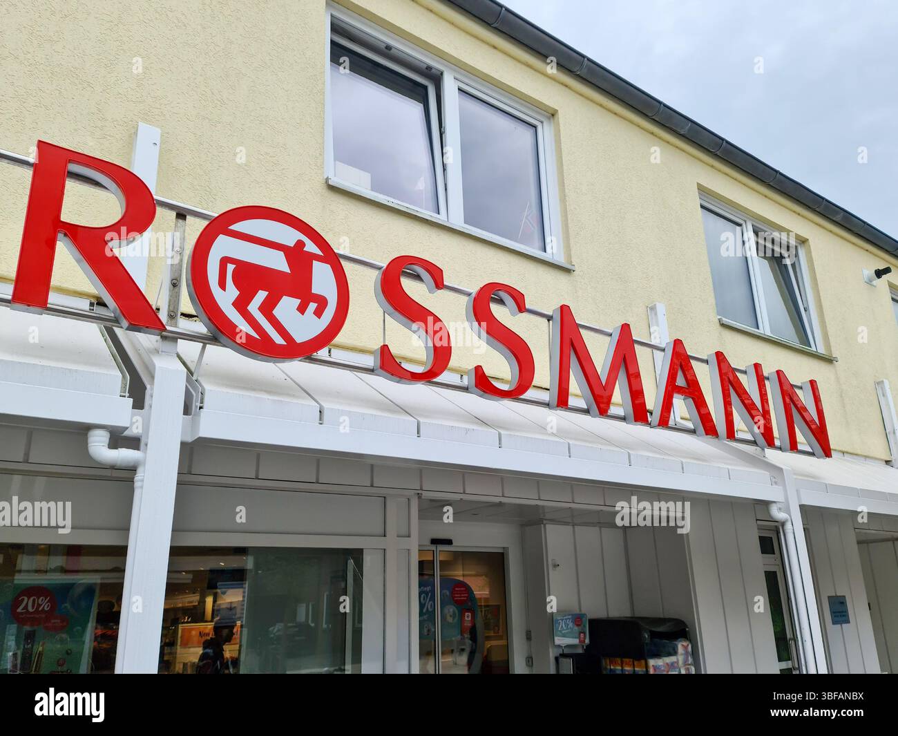 Kiel, Germany - 28. May 2025: Red Rossmann logo shining above the ...