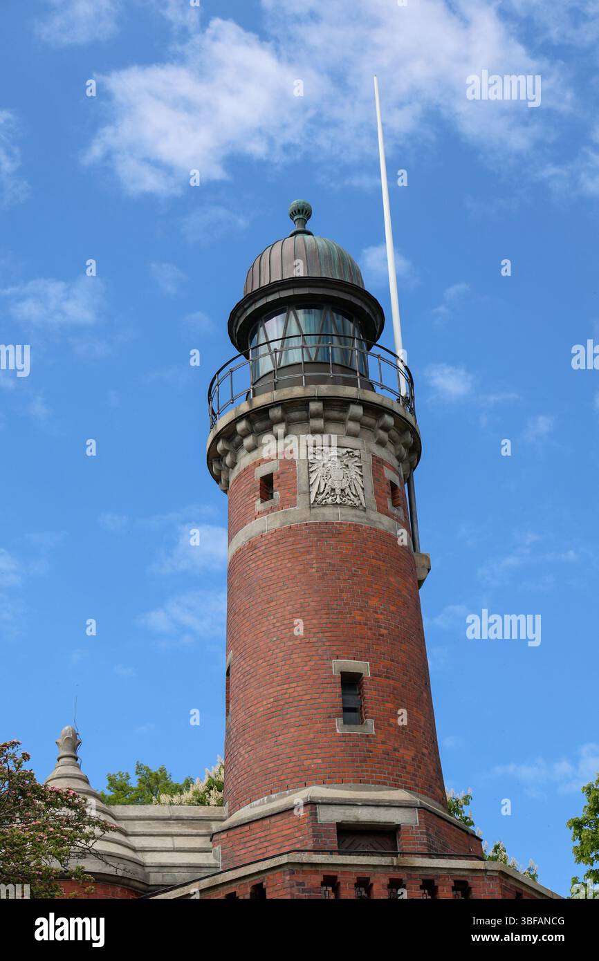 Kiel, Germany - 28. May 2025: Red brick lighthouse with copper roof and ...