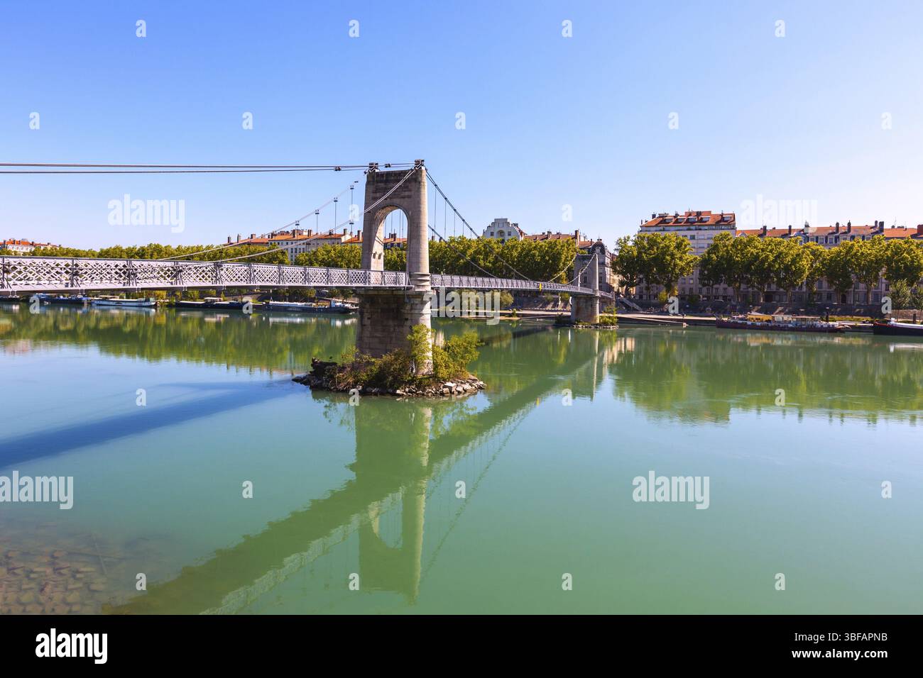 Old Passerelle du College bridge over Rhone river in Lyon, France ...