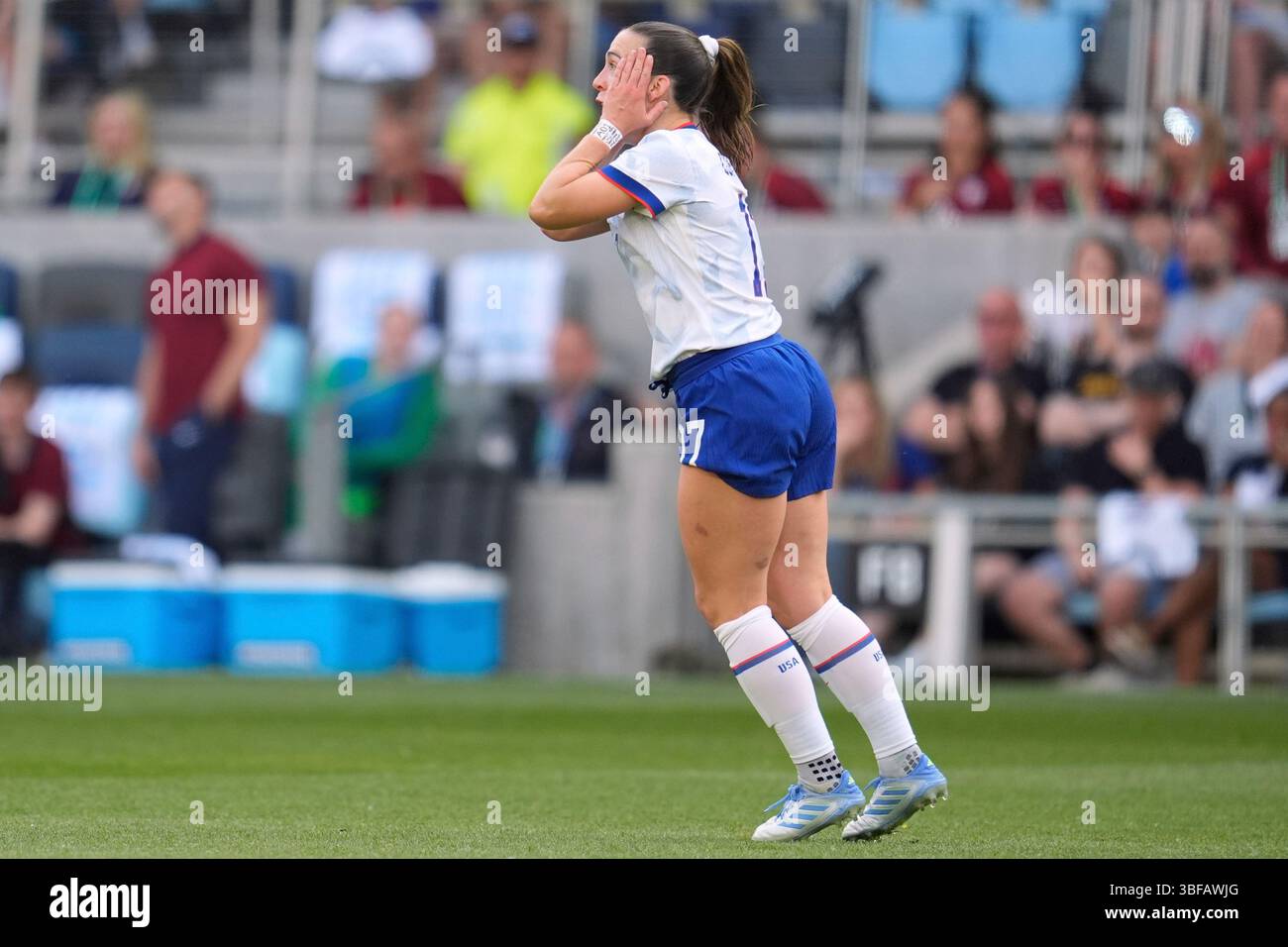 US midfielder Sam Coffey (17) reacts after a call by a referee during ...