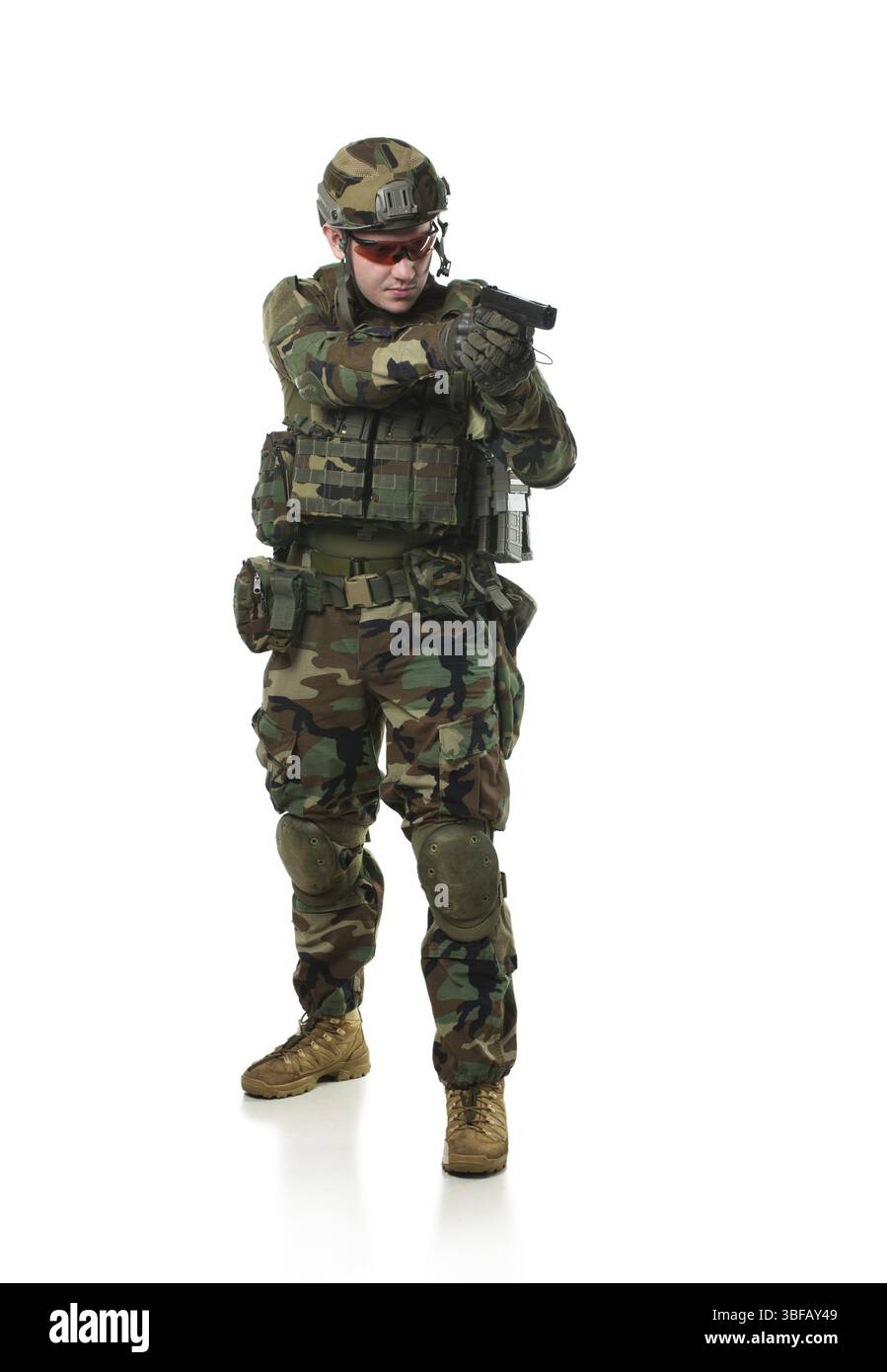 NATO soldier in full gear. Military man isolated over white background ...