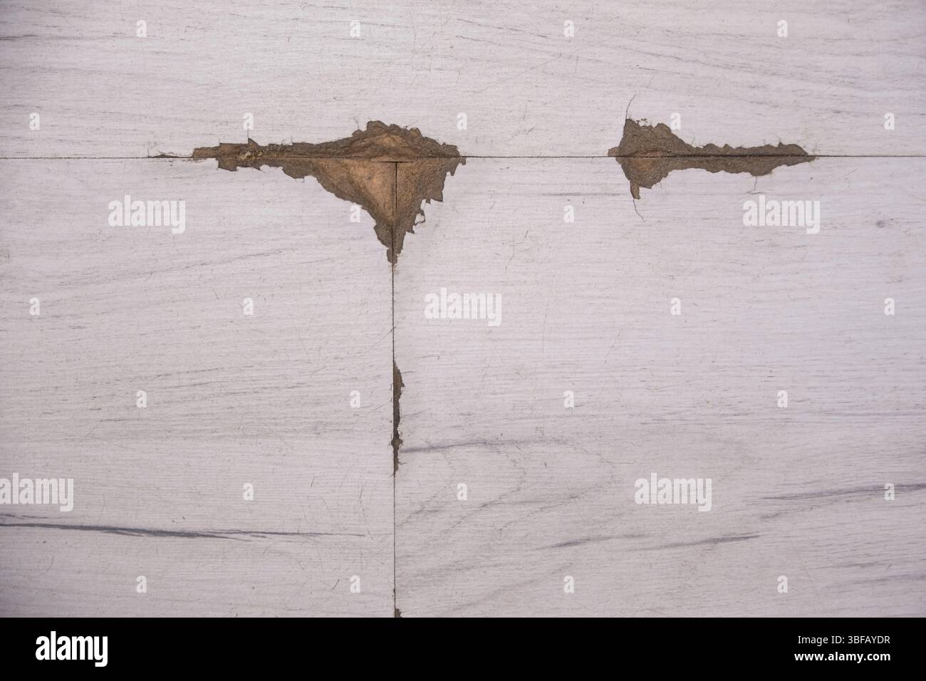 Poor quality light laminate was damaged during use Stock Photo - Alamy
