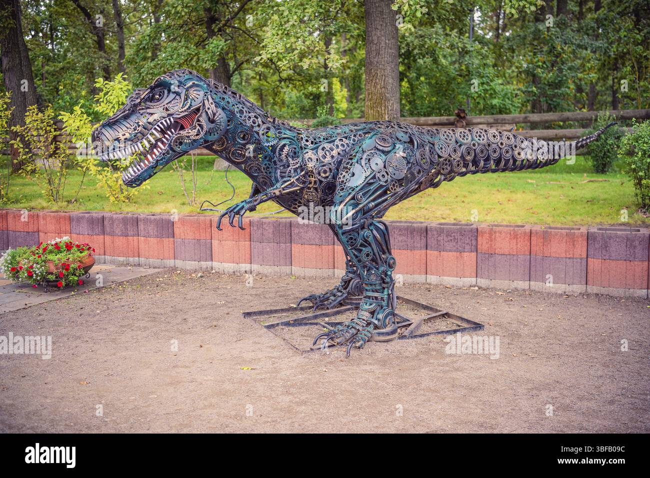 Tyrannosaurus rex T-rex sculpture made of metal gears and parts in ...