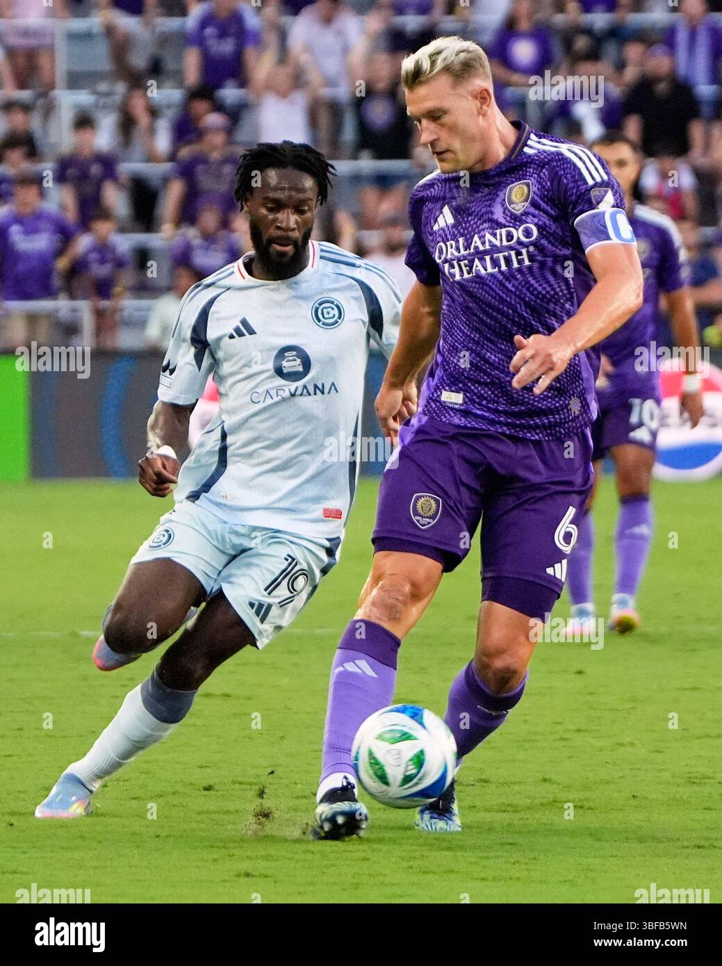 Orlando City defender Robin Jansson (6) moves the ball past Chicago ...