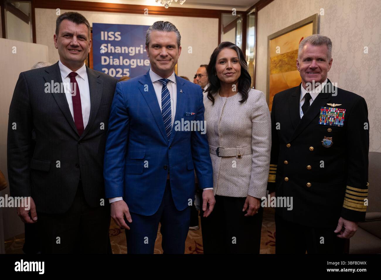 Secretary of Defense Pete Hegseth poses for a photo with U.S. Director ...