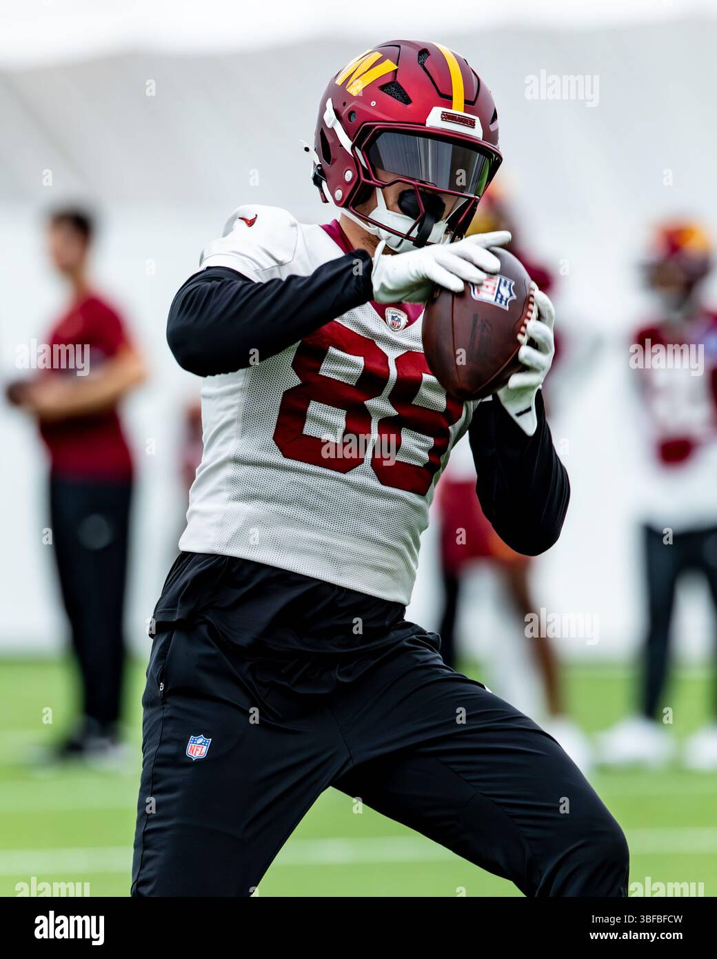 Washington Commanders tight end Cole Turner (88) running drills during ...