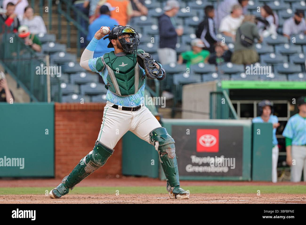 Greensboro, NC, USA. 30th May 2025. Greensboro Grasshoppers catcher ...