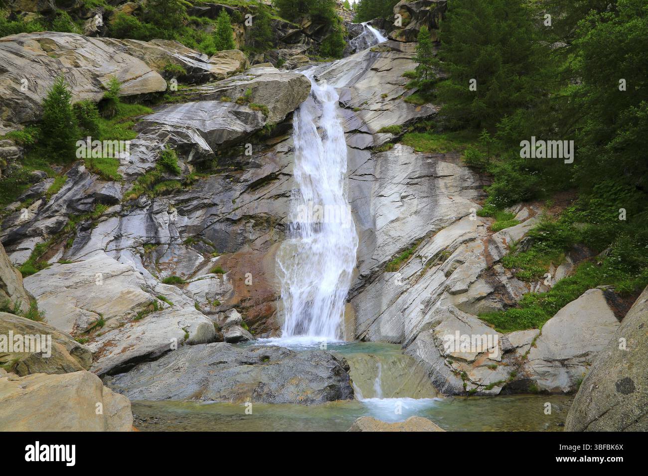 Saas Valley waterfall Stock Photo - Alamy