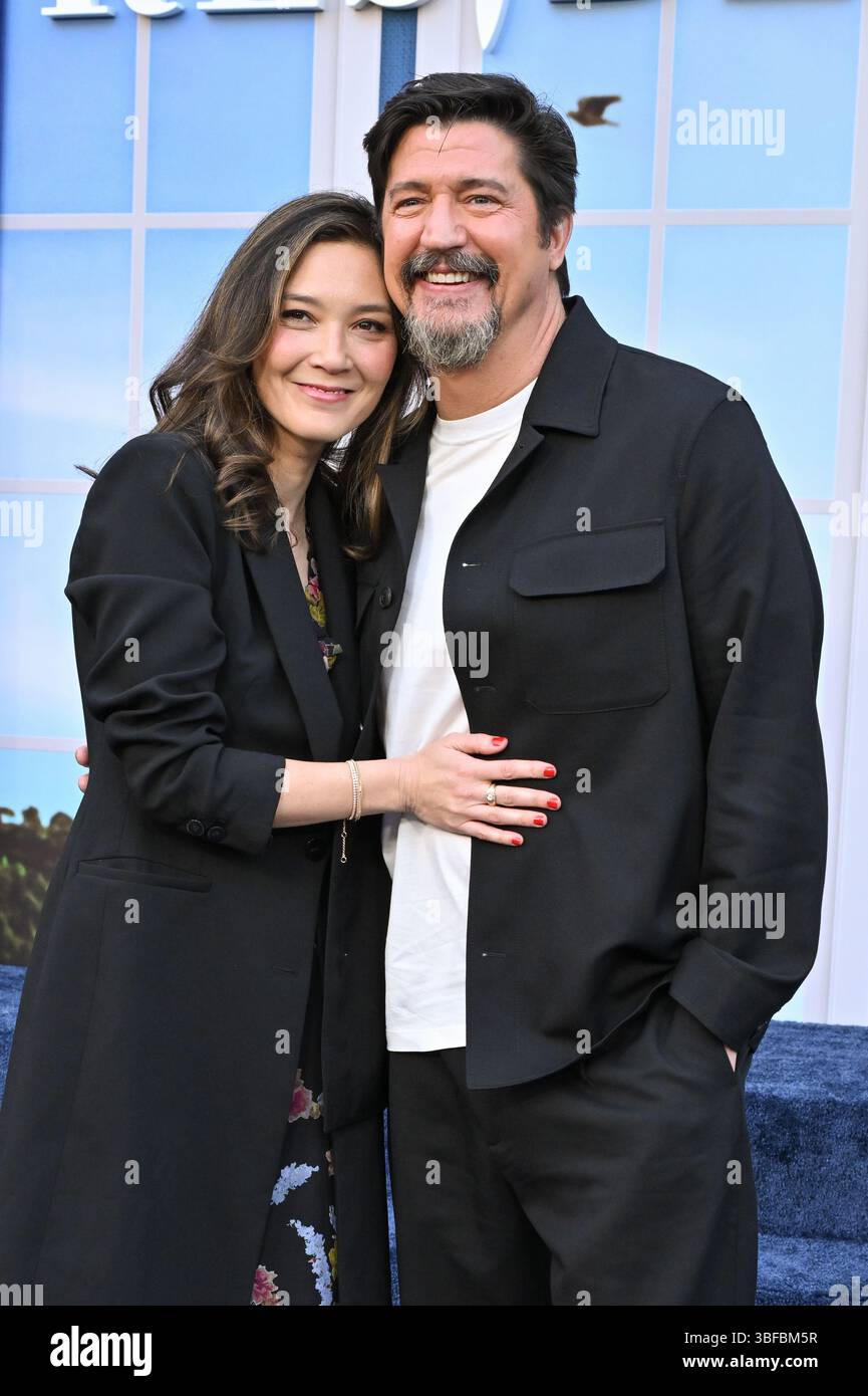 Hollywood, USA. 27th May, 2025. Erica Oyama and Ken Marino arriving to ...