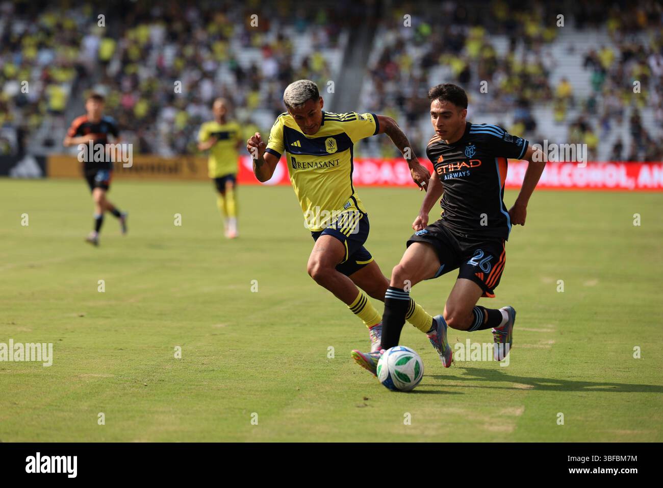 NASHVILLE, TN - MAY 31: Andy Najar #31 of Nashville SC and Agustin Ojeda #26 of New York City FC ...