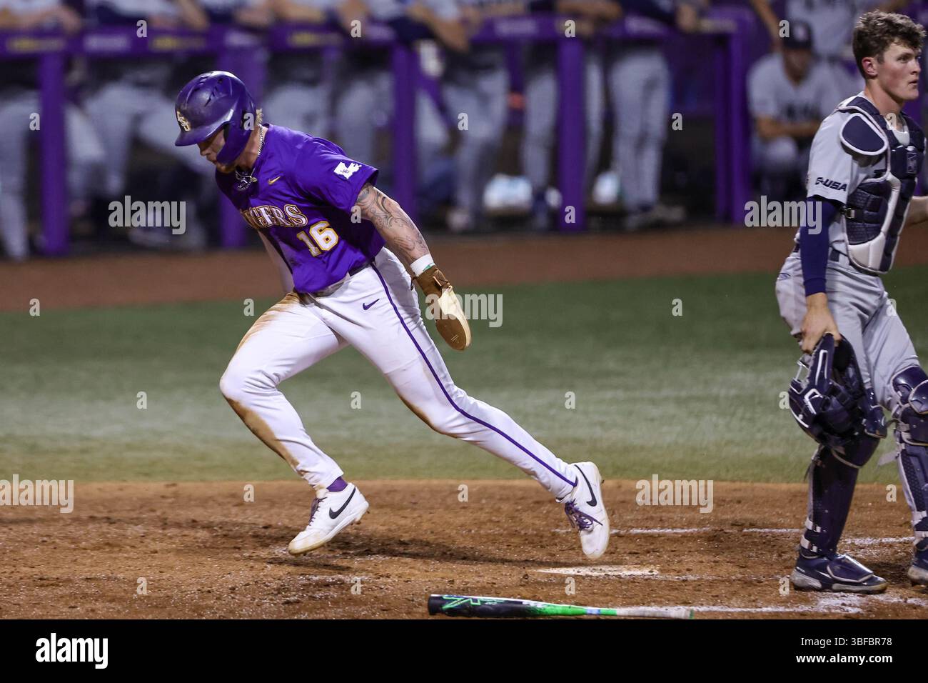 May 31, 2025: LSU's Ethan Frey (16) crosses home plate for a run during ...