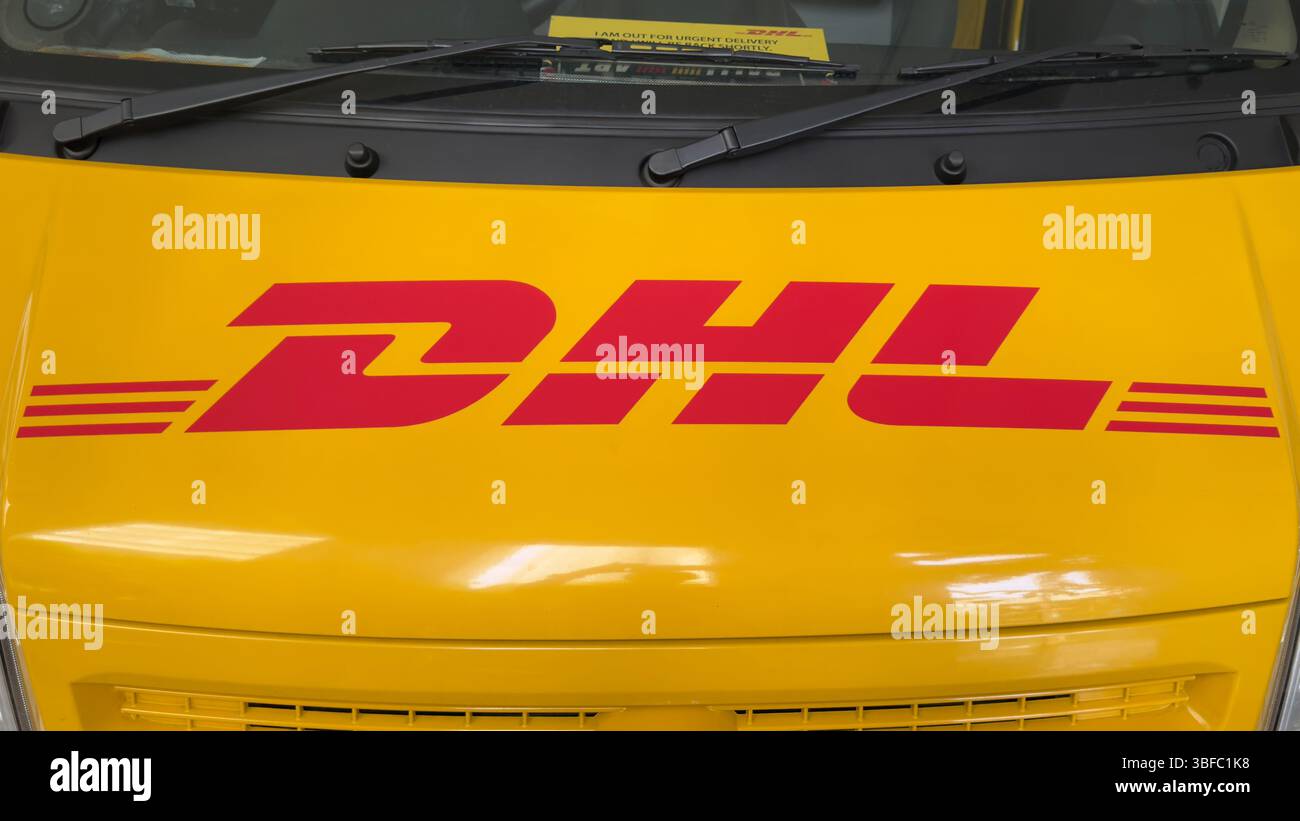 Penang, Malaysia – April 16, 2025: A DHL delivery van stands ...