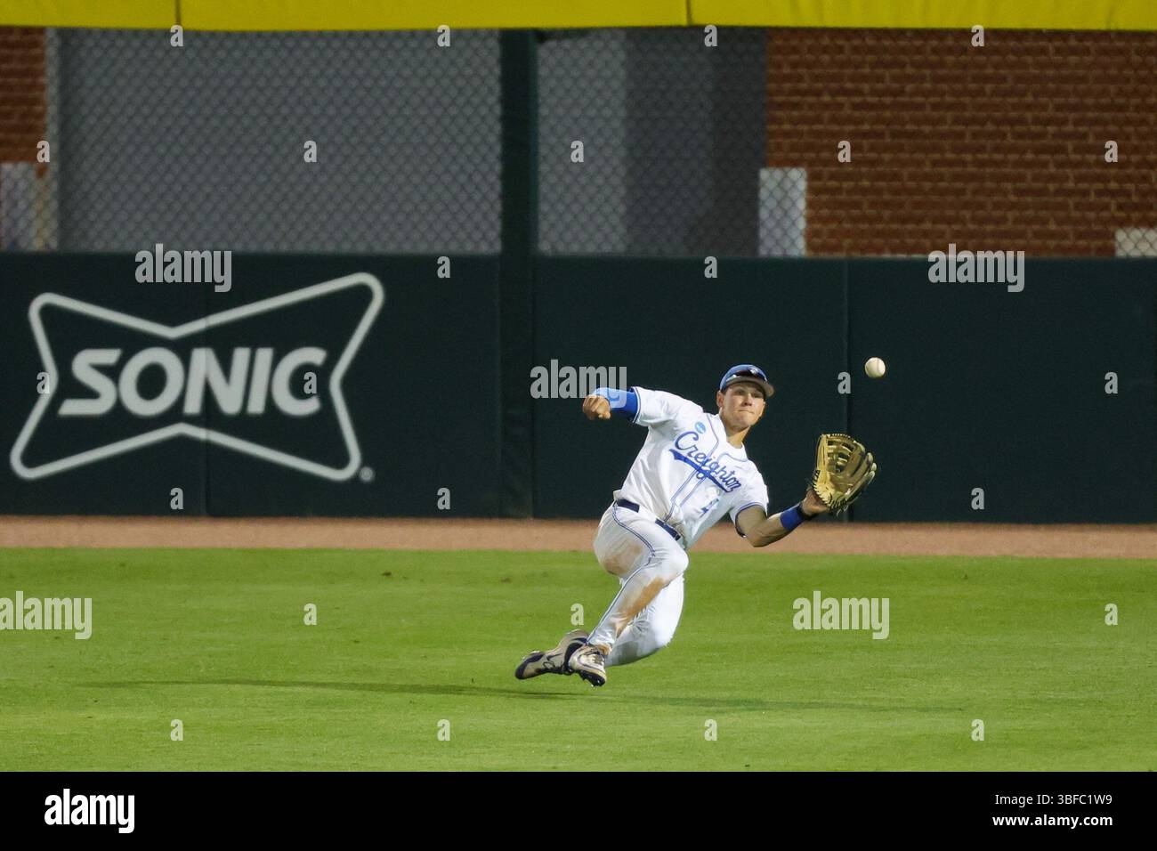 May 31, 2025: Creighton outfielder Teddy Deters (4) comes in a makes a ...