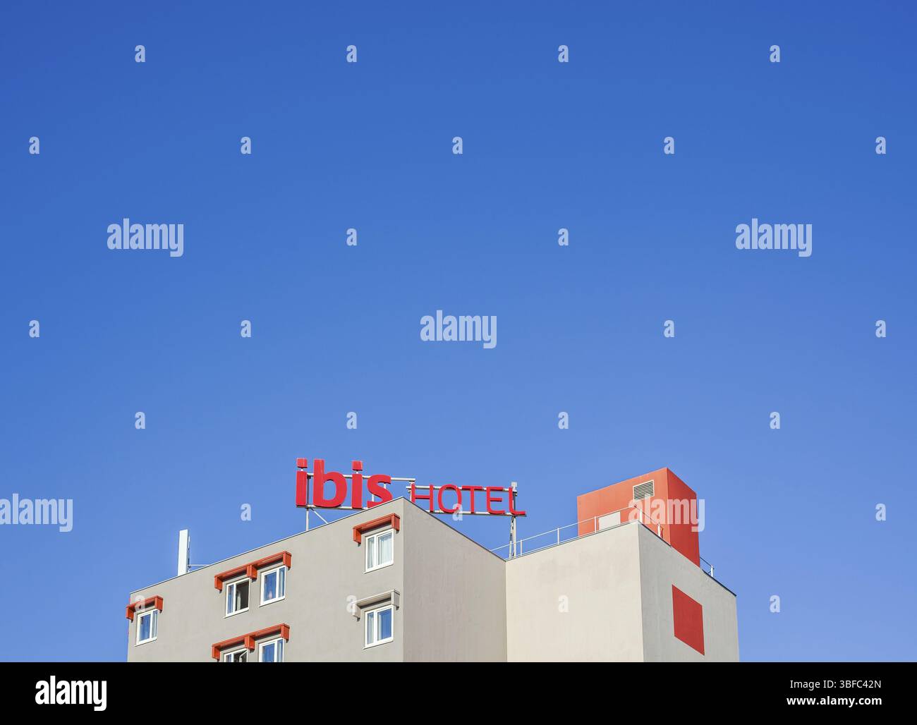 BEZIERS, FRANCE - FEBRUARY 26, 2018: Ibis logo at hotel building located in Beziers, France ...