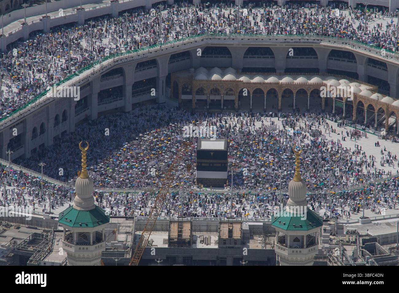 FILE - FILE - Muslim pilgrims circumambulate the Kaaba, the cubic ...