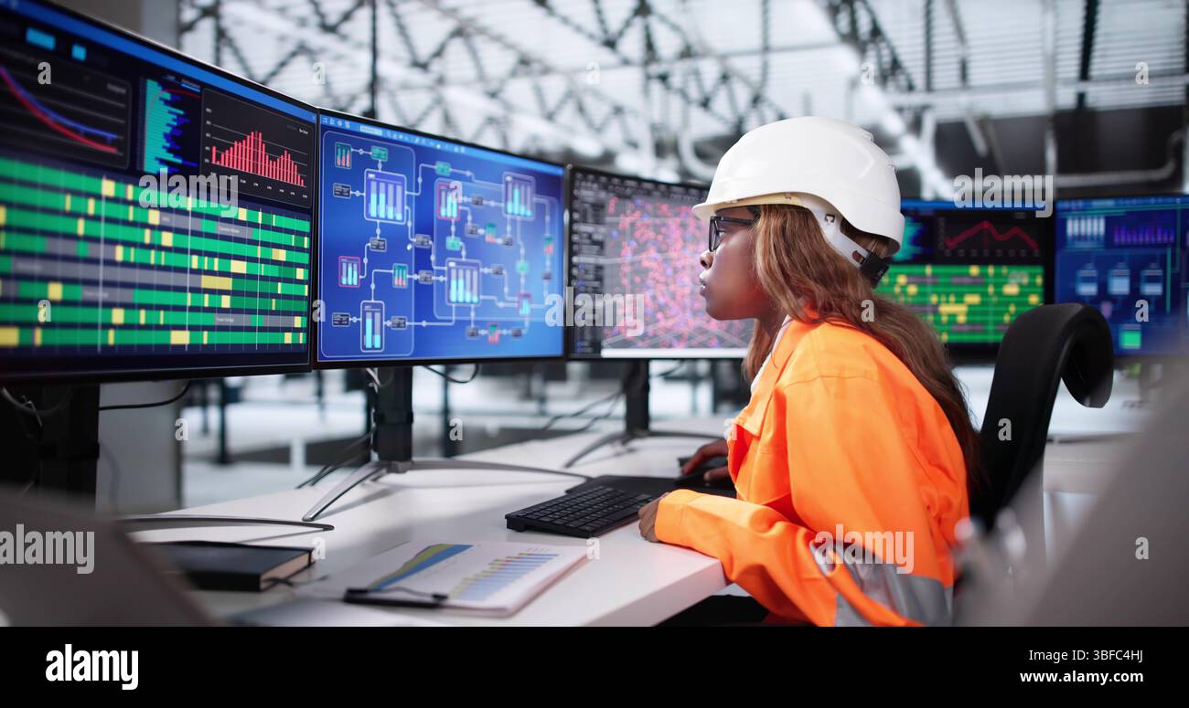 African American Woman Uses SCADA Software To Monitor Semiconductor ...