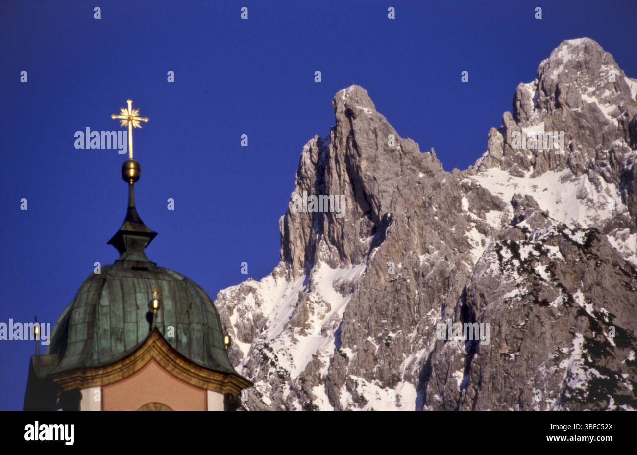 Church spire and quadruple spire under the foehn sky Stock Photo - Alamy