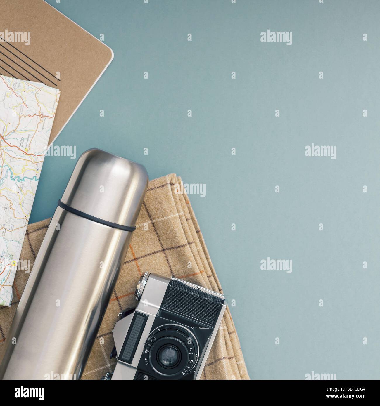 Creative Top view flat lay outdoors trip composition. Thermos map retro ...