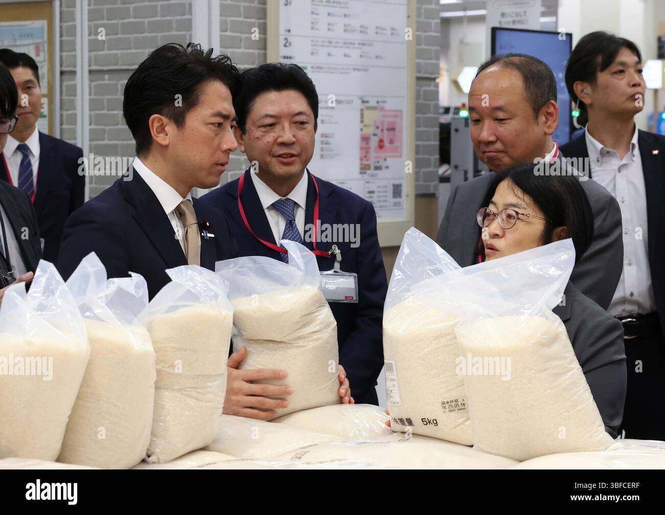 Japanese Agriculture Minister Shinjiro Koizumi inspects a store selling ...