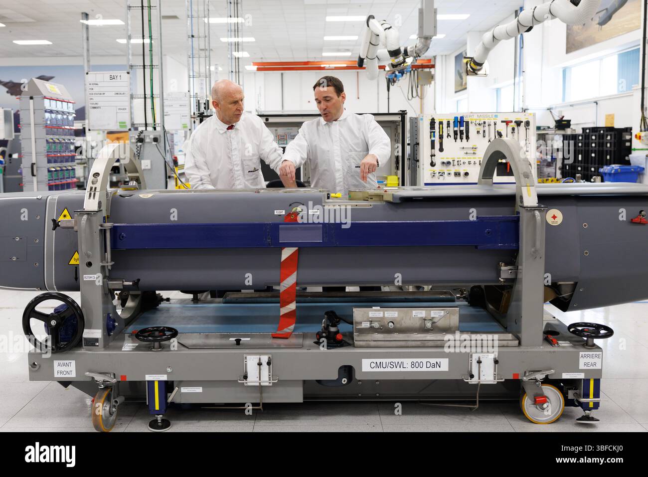 Director of Mechanical Engineering Matt Beamont (right) shows Defence ...