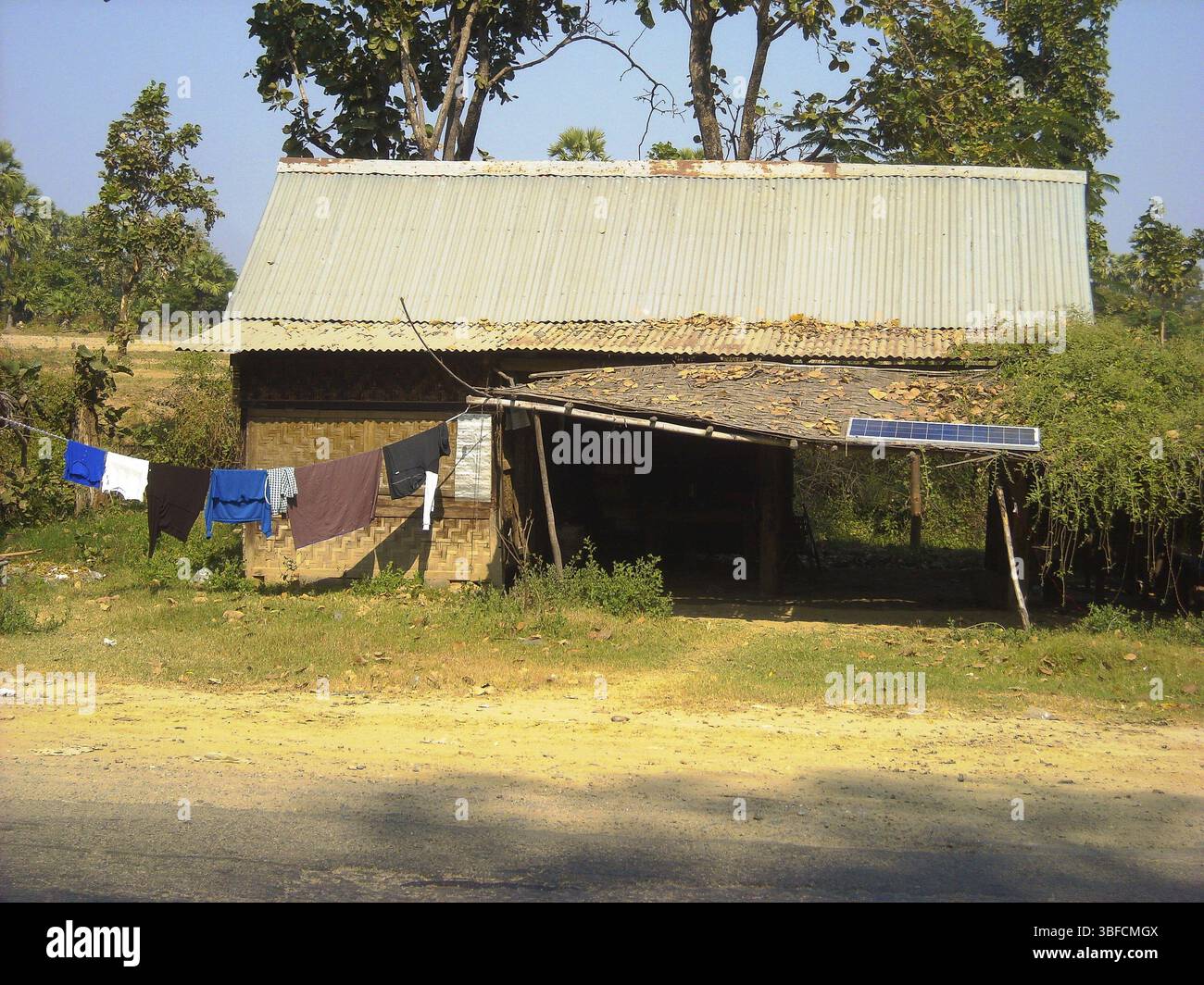 An old house in the jungle in burma Stock Photo - Alamy