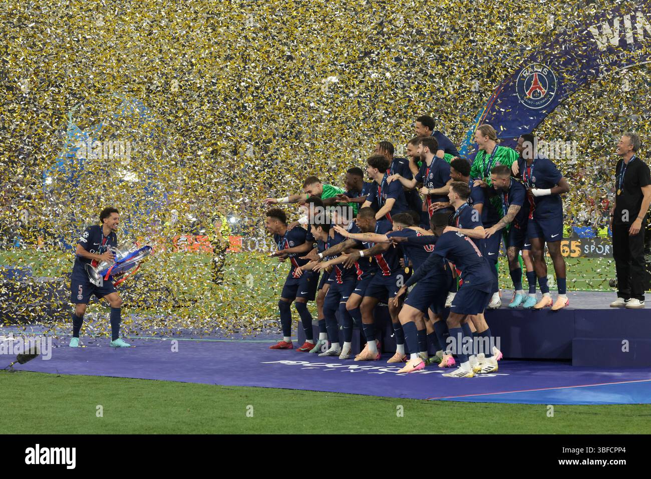 Captain of PSG Marquinhos and teammates during the trophy ceremony ...