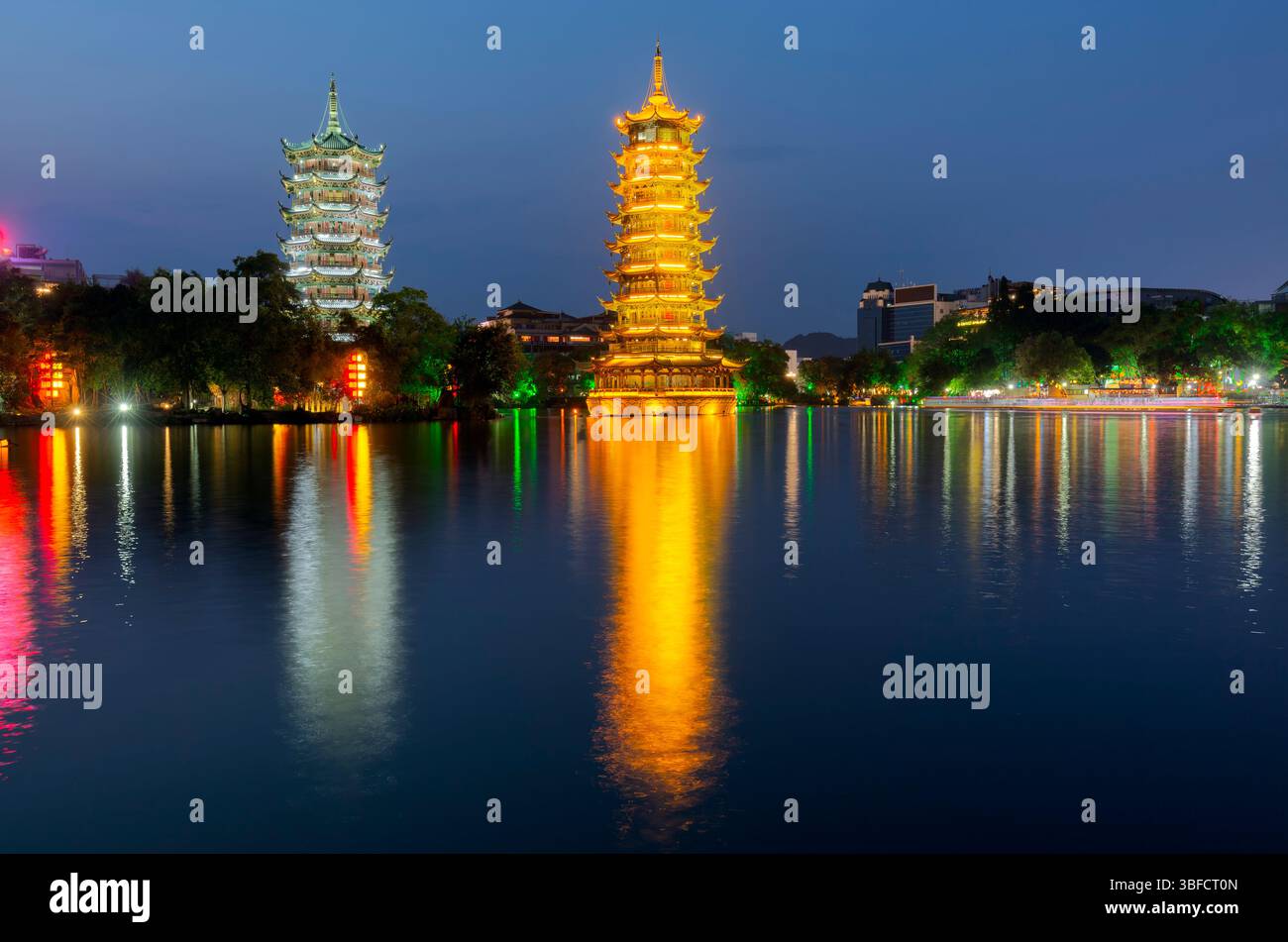 Night view of the Sun and Moon Twin Pagodas at Shanhu Lake (Fir Lake ...