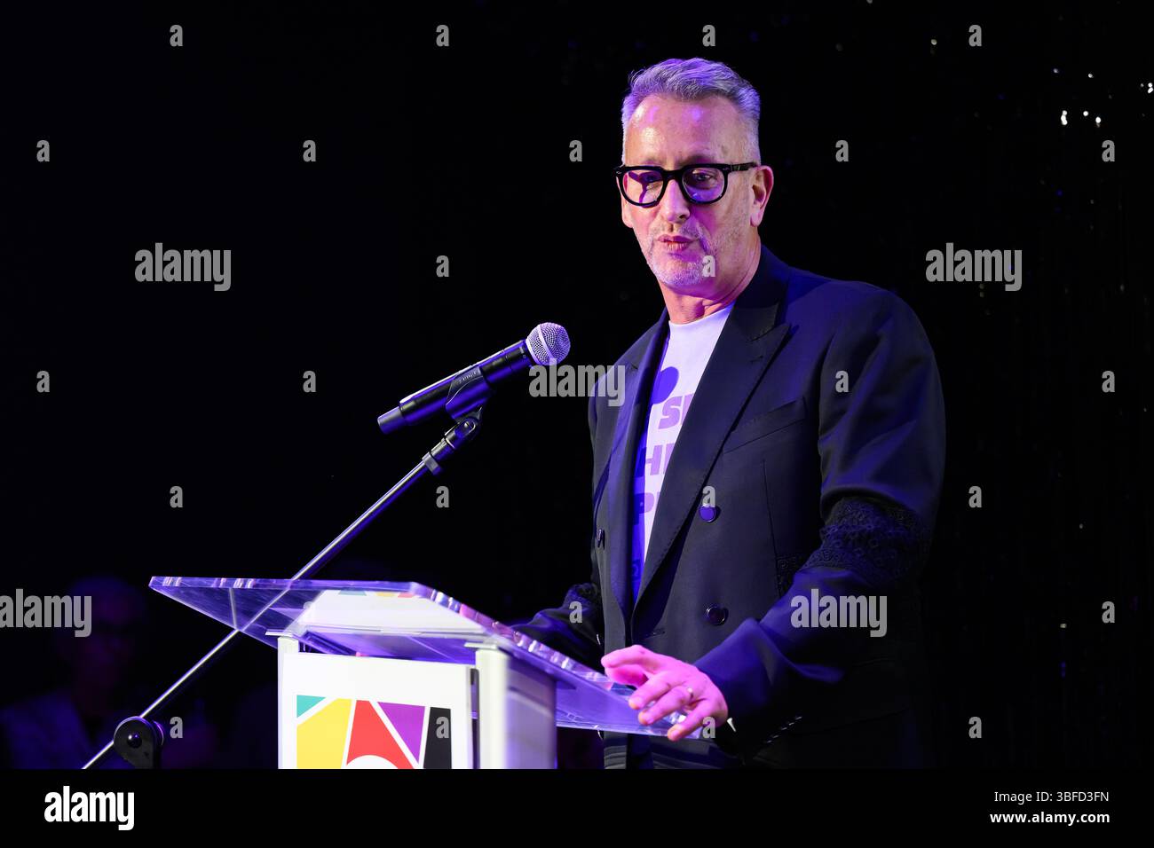Qtopia Sydney CEO Greg Fisher speaks to attendees during the launch ...