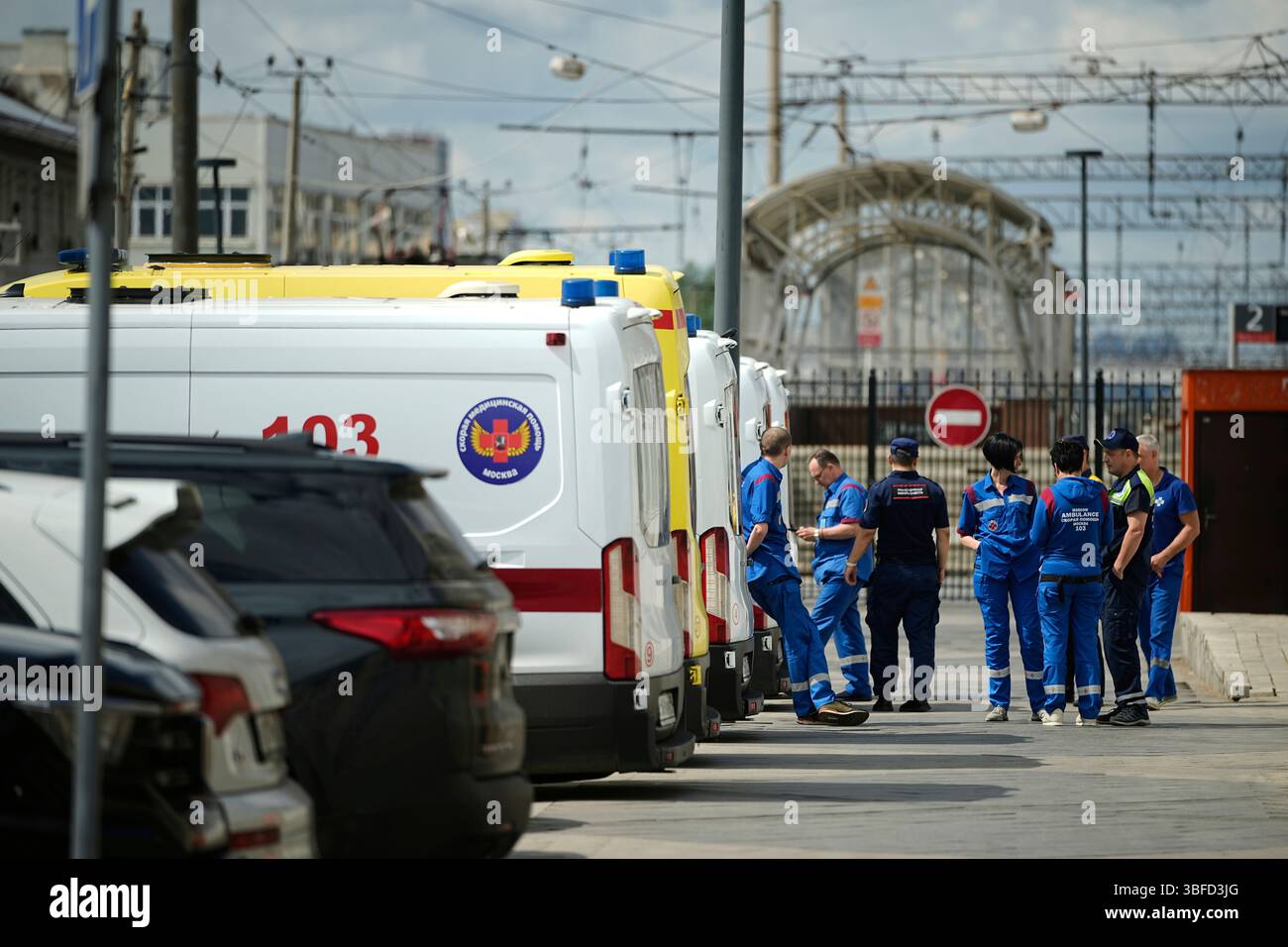 Emergency medics wait for the arrival of wounded passengers after a ...