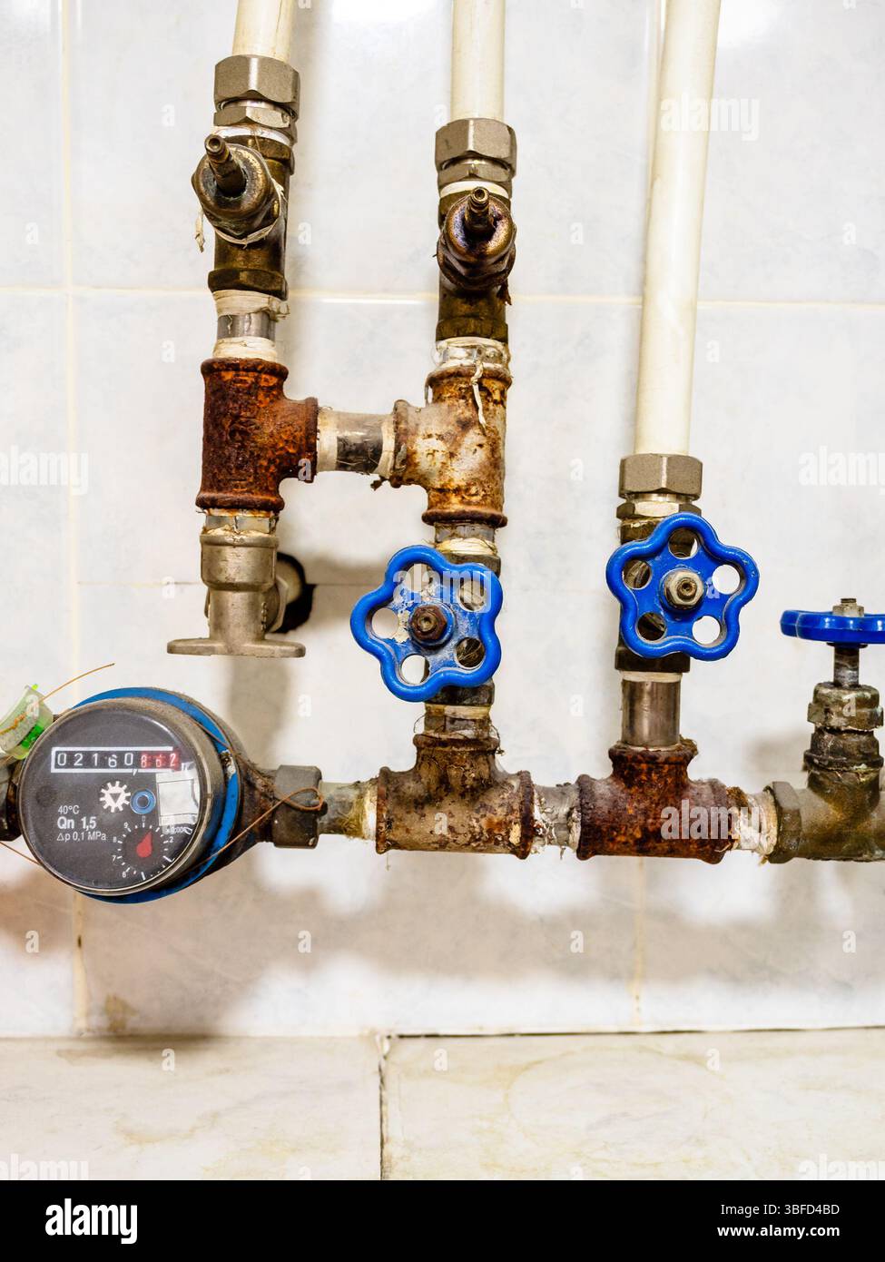 old water supply valves and water flow meter close up at home Stock ...