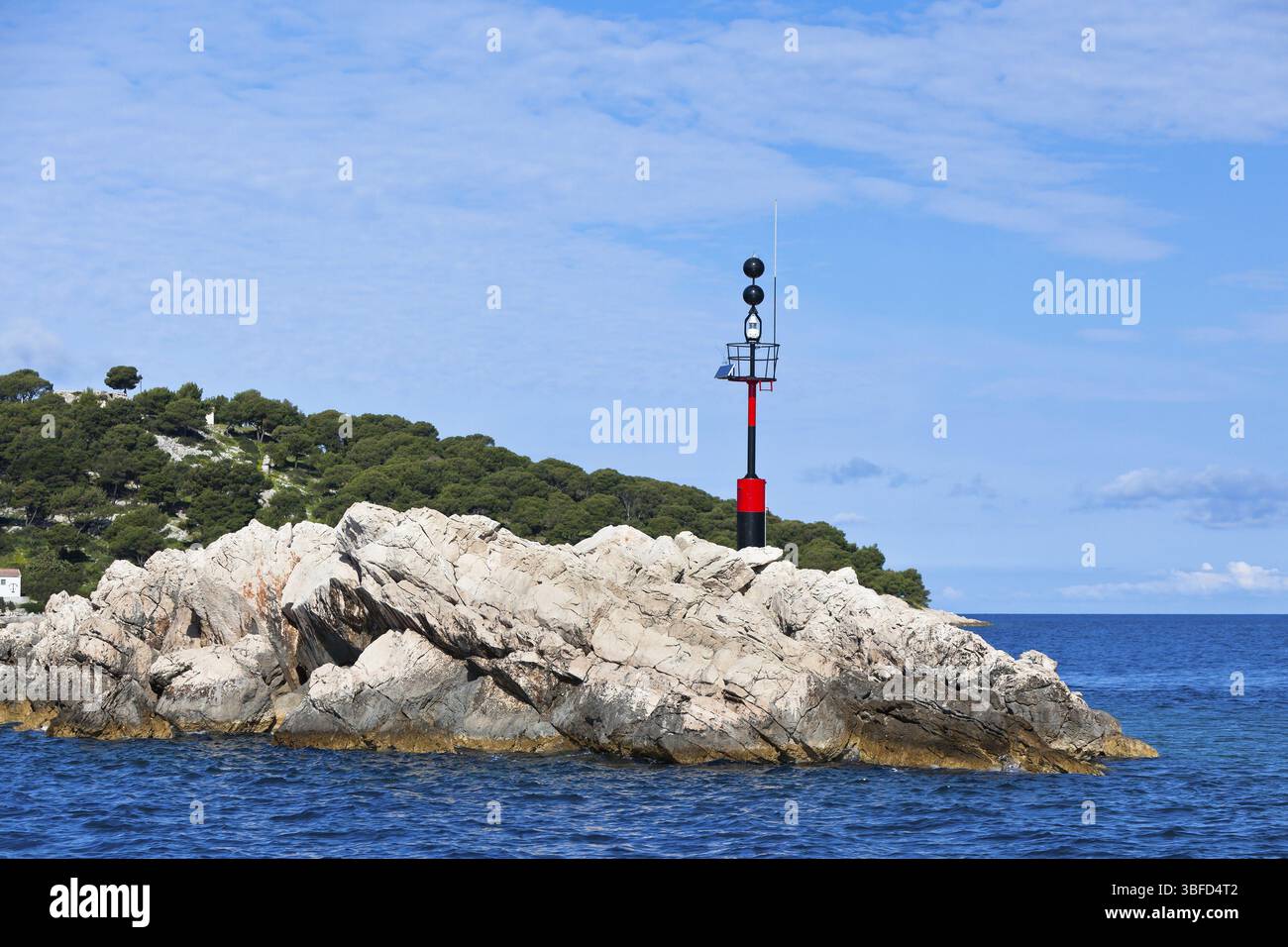 Hazard Beacon - nautical danger sign on a rock in the sea Stock Photo ...