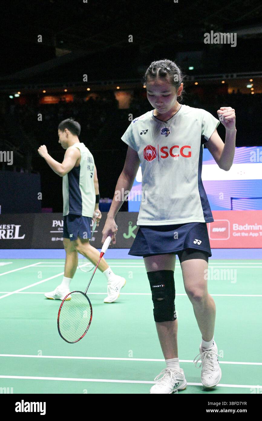 Singapore. 1st June, 2025. Dechapol Puavaranukroh/Supissara Paewsampran (R) of Thailand react ...